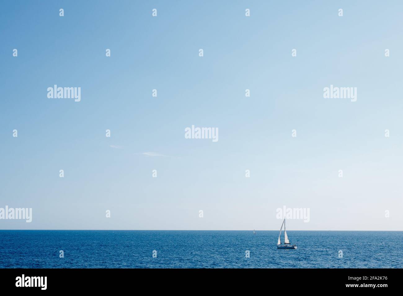Sailing ship on the high seas against the blue sky Stock Photo - Alamy