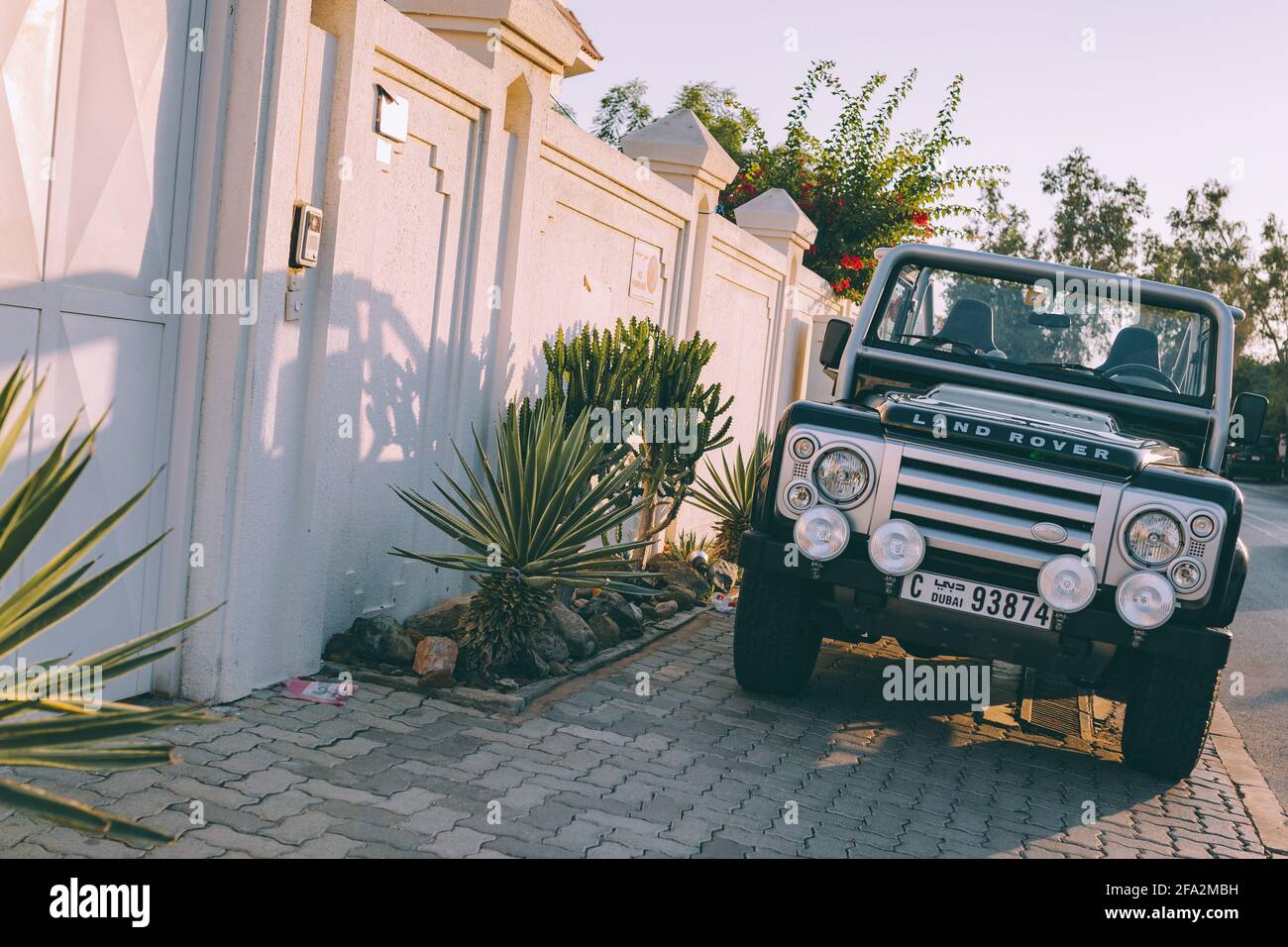 Dubai, UAE - November 16, 2013. Land Rover parked next to a villa Stock ...