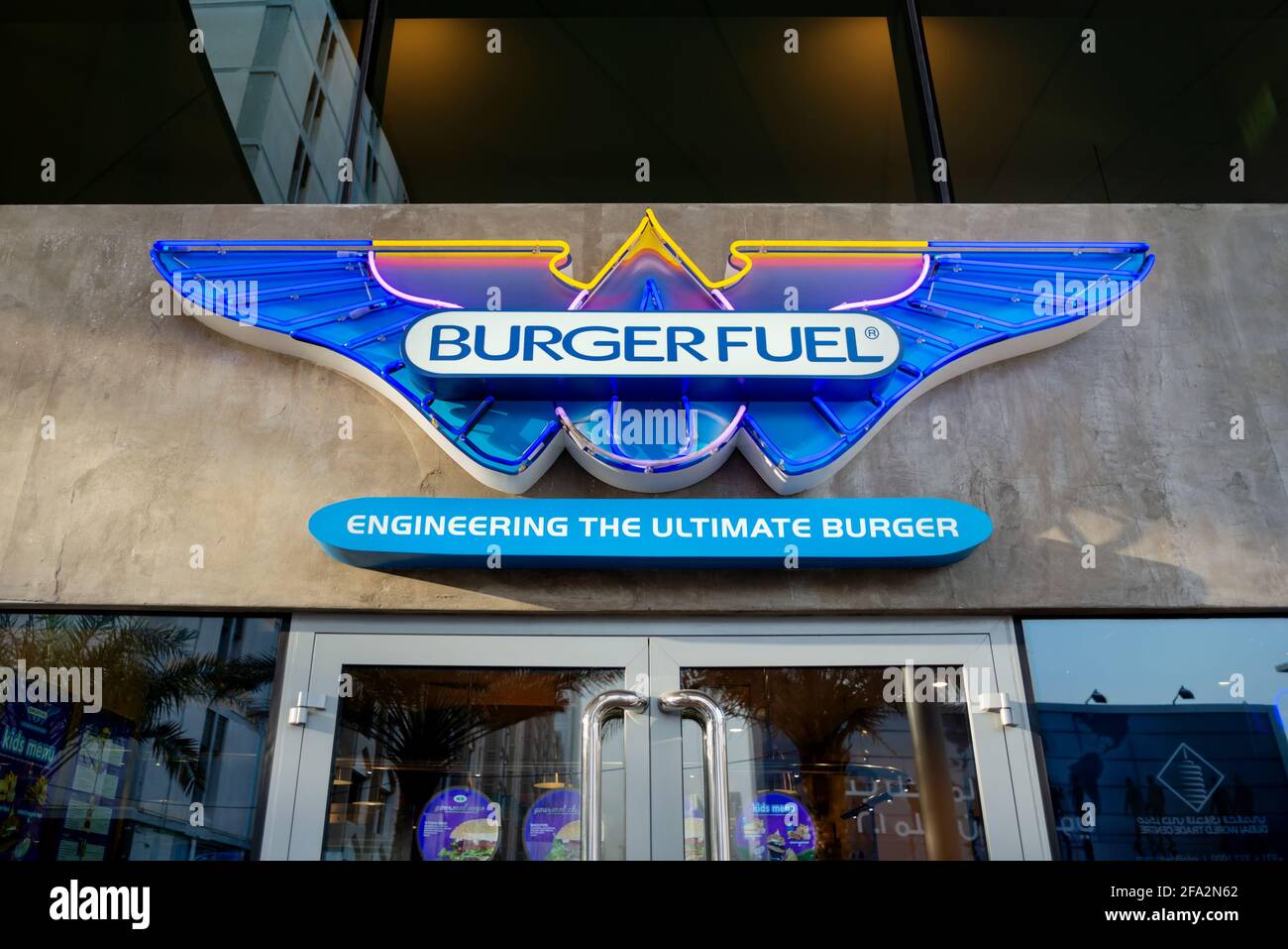 Dubai, UAE - May 28, 2013. Burger Fuel logo at the entrance of the fast ...
