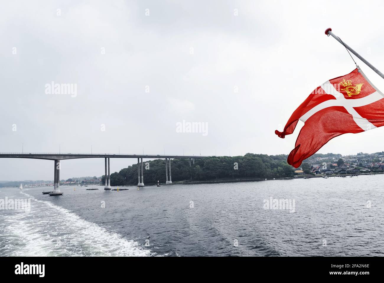 Copenhagen, Denmark - August 14, 2018. A ferry with the Danish flag ...