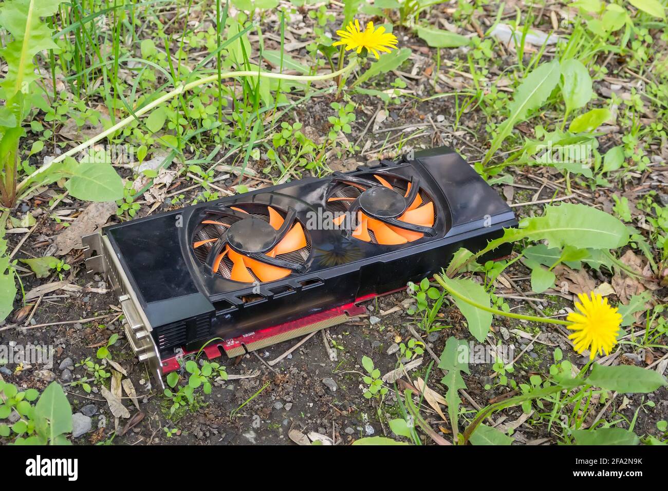 Broken graphics card after bitcoin mining, dumped in a landfill Stock ...