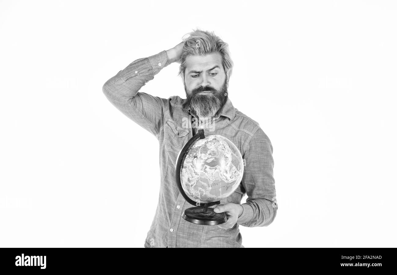 Around the world. Travel and wanderlust. Bearded man with globe. Earth ...