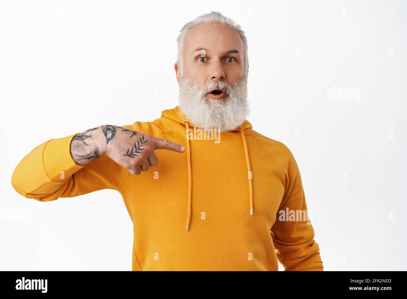 Surprised hipster old man gasping, pointing at himself and look in awe ...