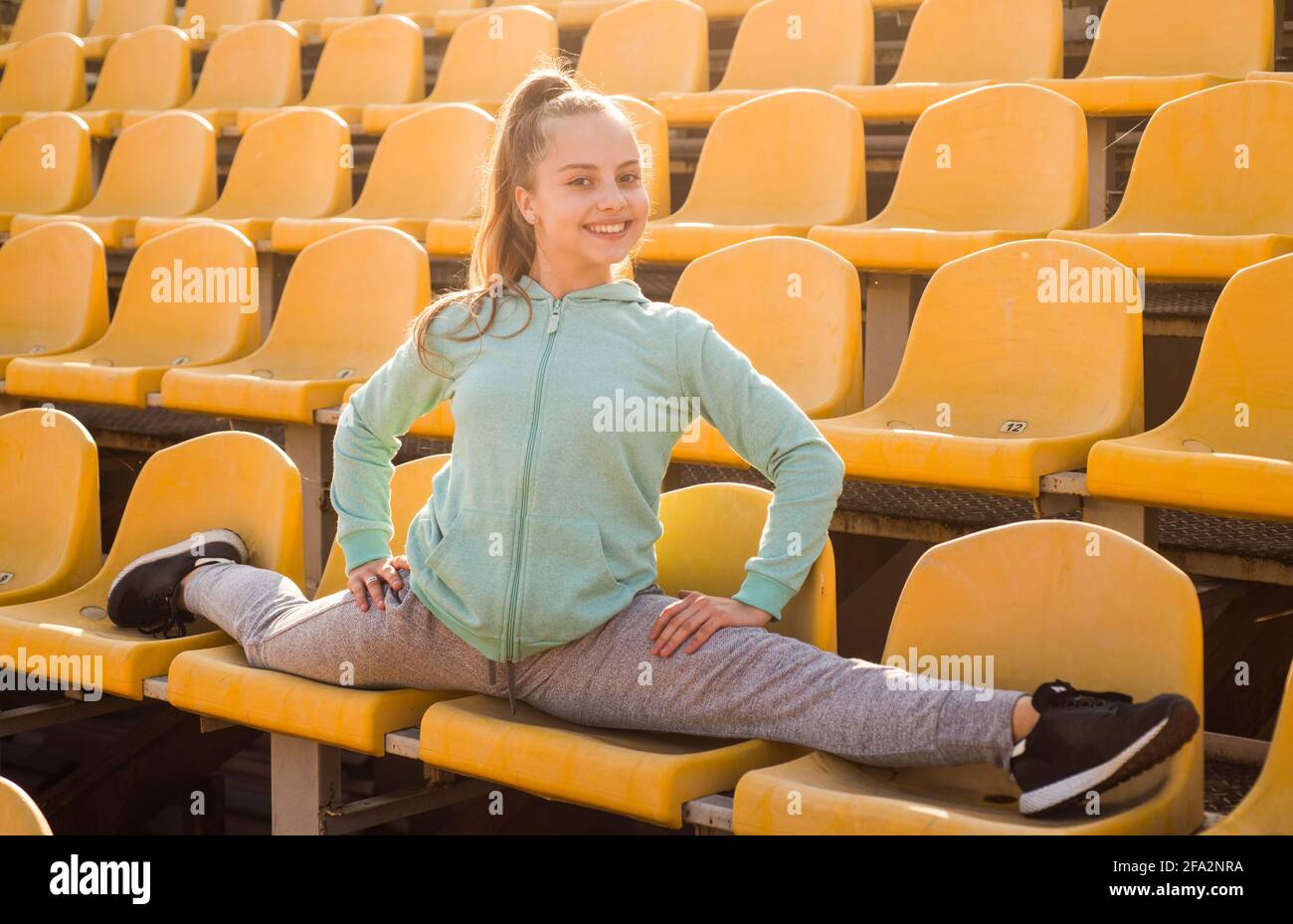 Gymnastics, flexible choice. Flexible teen gymnast do splits. Gymnastic ...