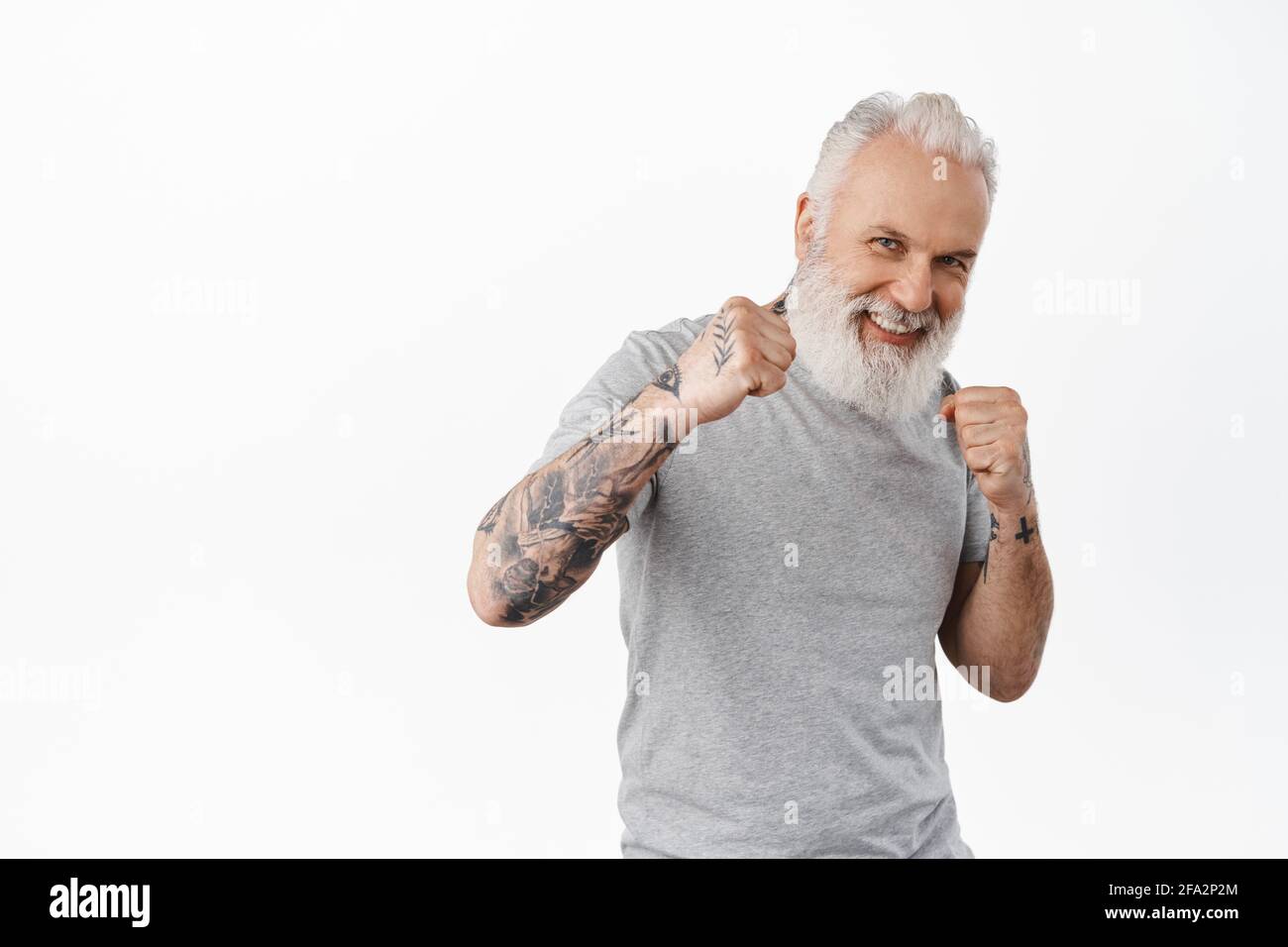 Business man ready to fight with boxing gloves Stock Photo - Alamy
