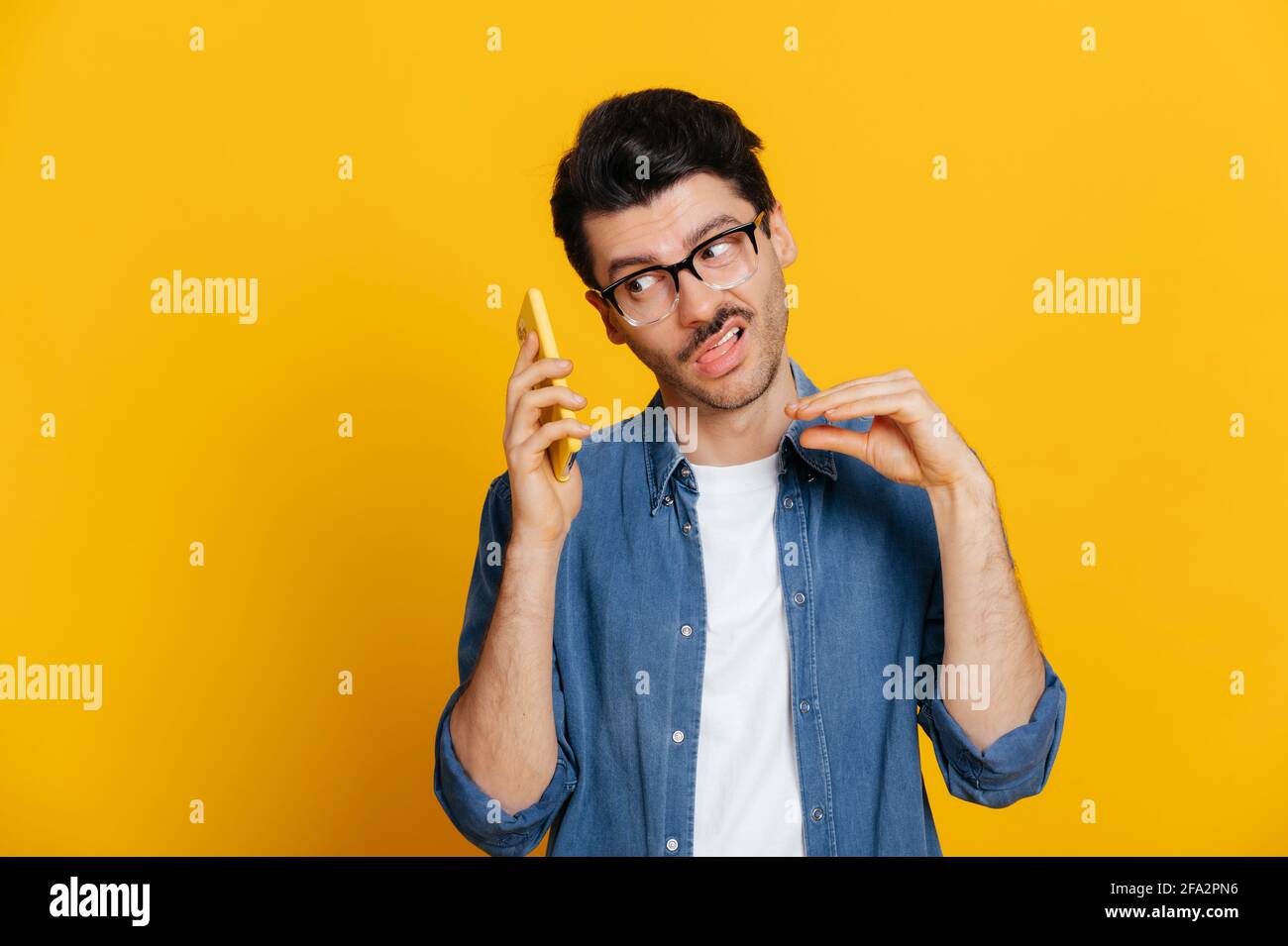 Phone call by cellphone. Attractive charismatic stylish guy has an ...