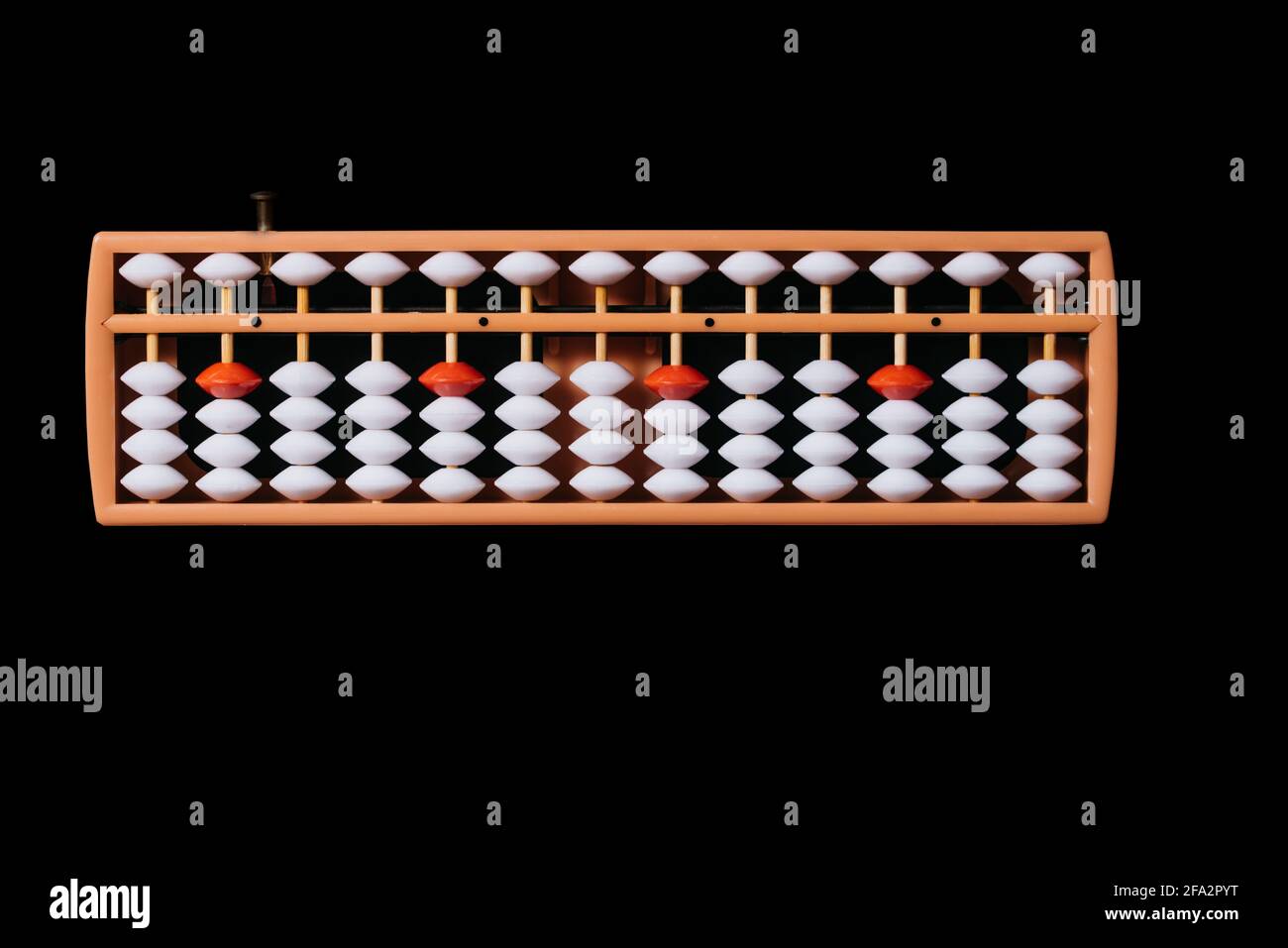 Japanese traditional abacus soroban on black background. Education and development concept. Back ...