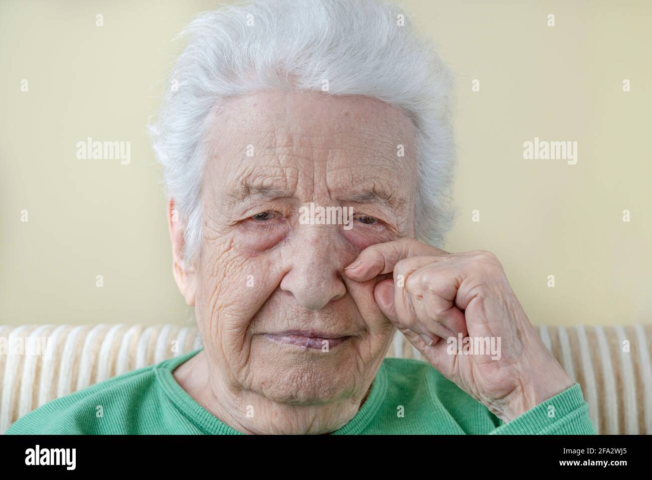 Senior woman crying hi-res stock photography and images - Alamy