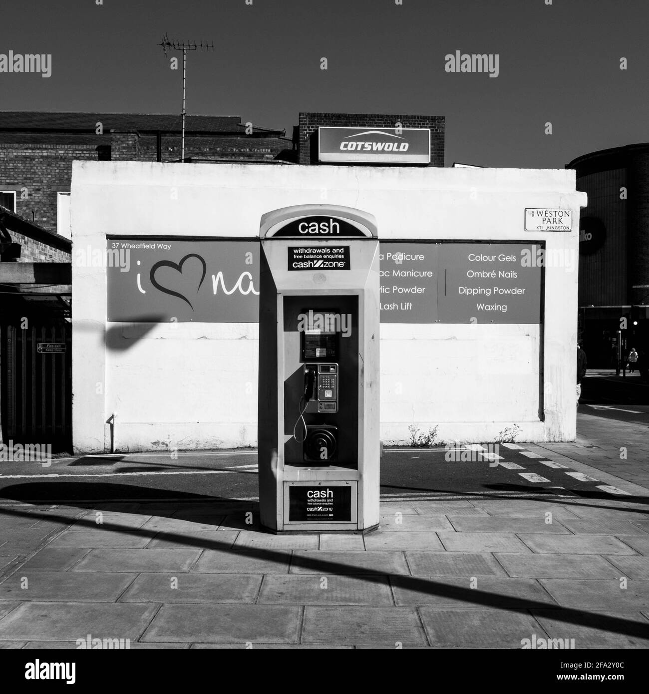 Black public telephone box Black and White Stock Photos & Images - Alamy