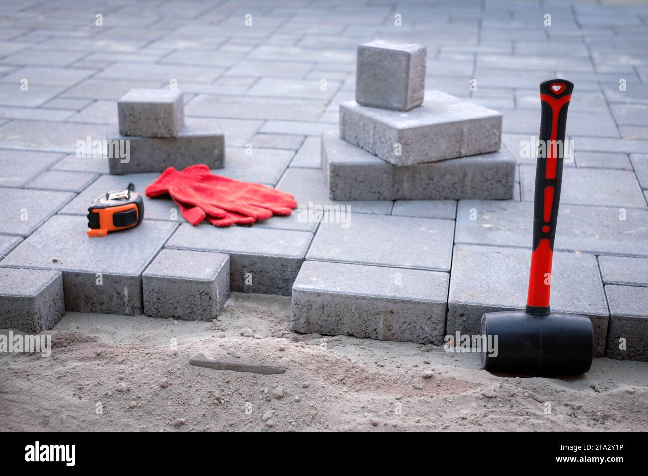 Paving stones paving background closeup Stock Photo - Alamy