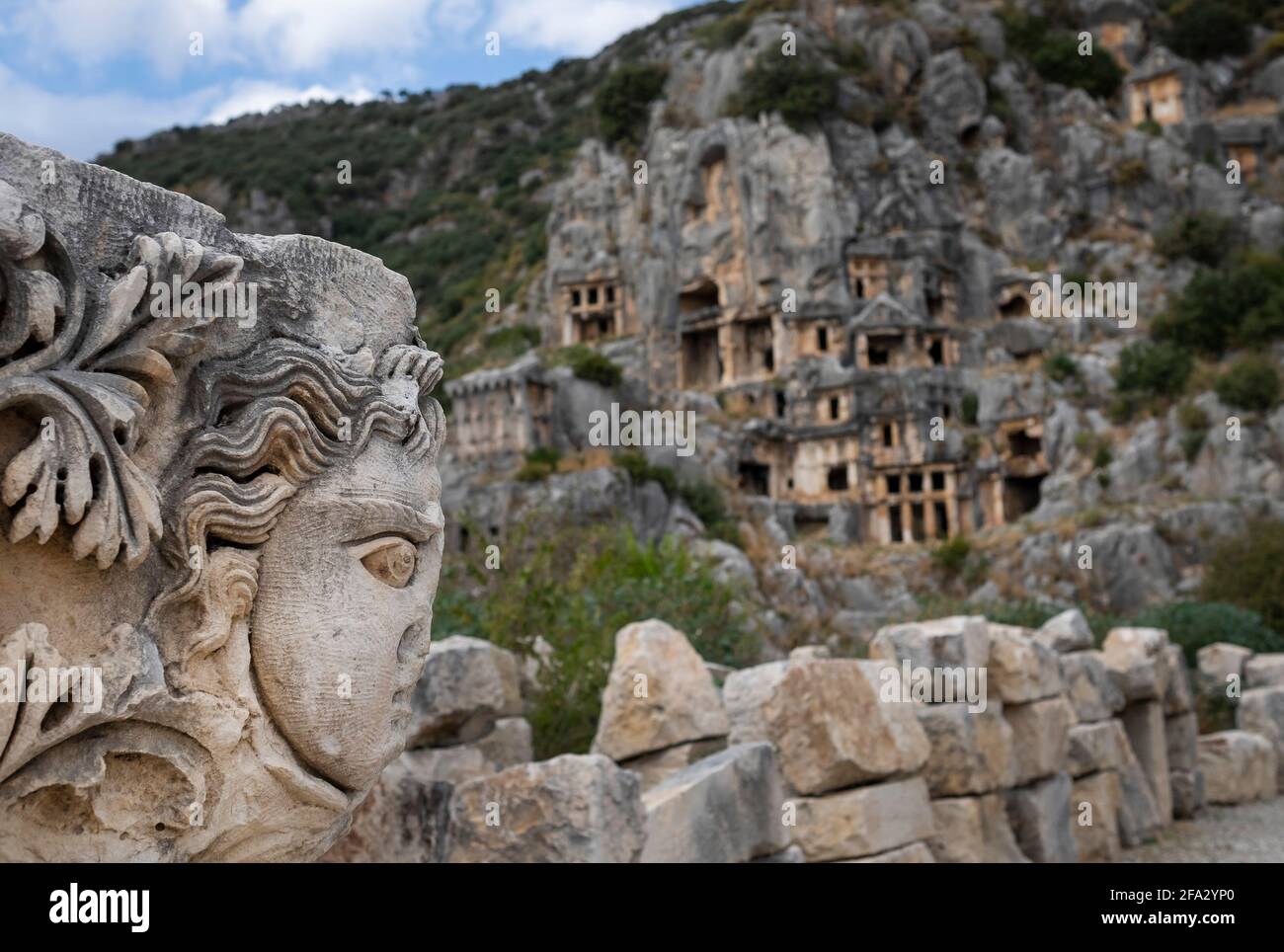 Ancient lycian Myra tombs and woman's stone face in Turkey, Demre Stock ...