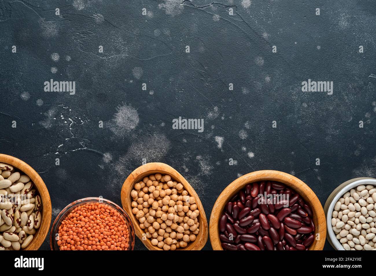Legumes, red lentils, chickpea, red and white beans assortment in ...
