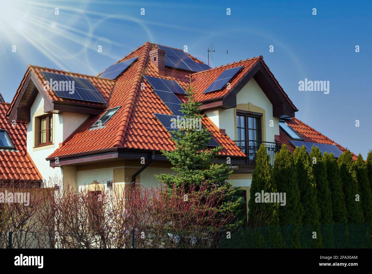 House with Solar Panels on the Roof. SUNLIGHT Stock Photo - Alamy