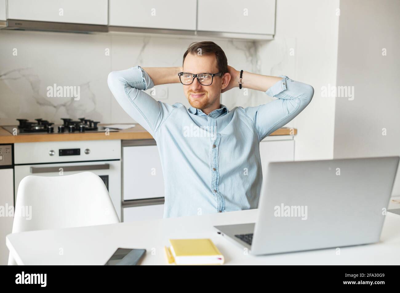 Hands behind head from back man hi-res stock photography and images - Alamy