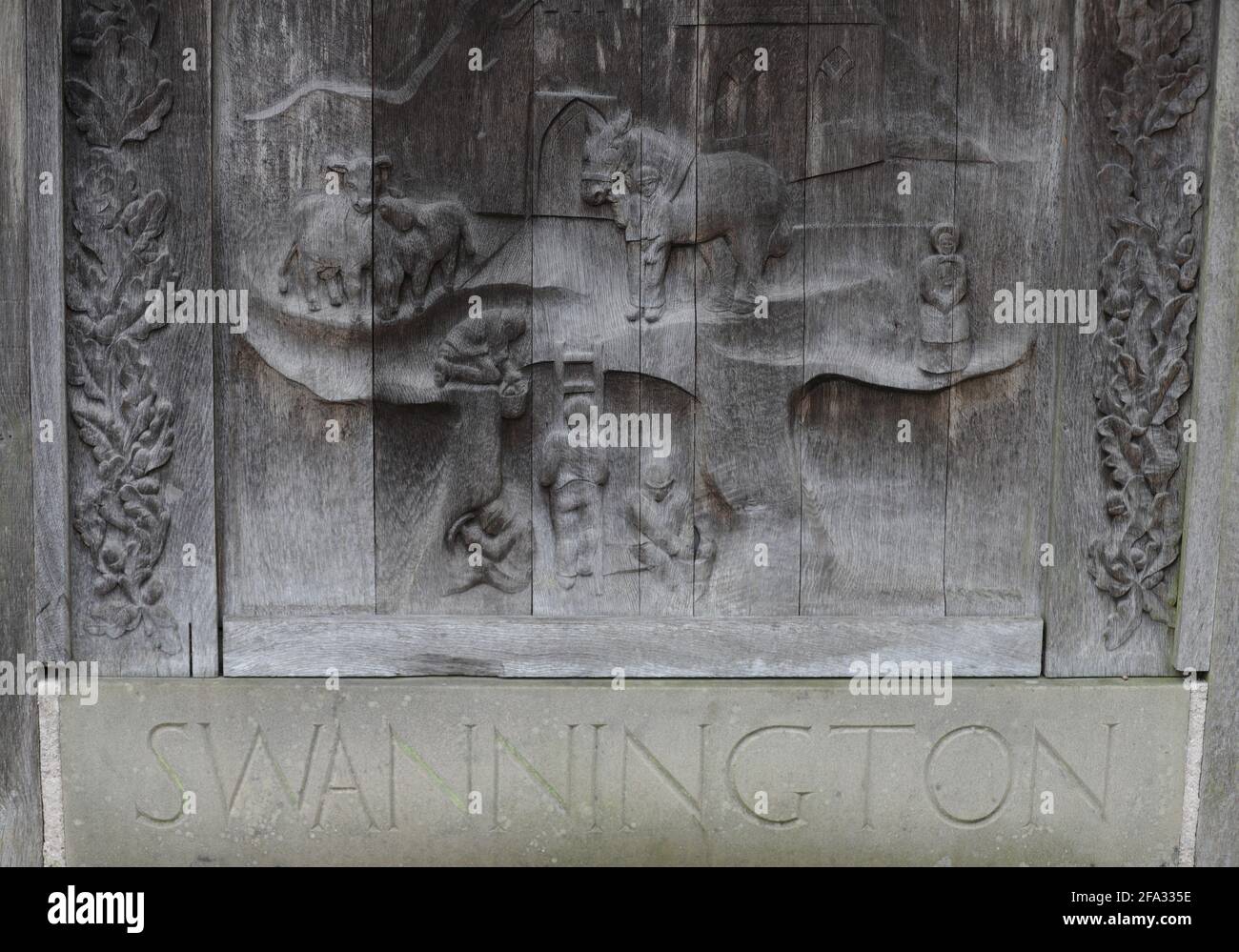 Swannington, Leicestershire, England. Village Centre sign with wood ...