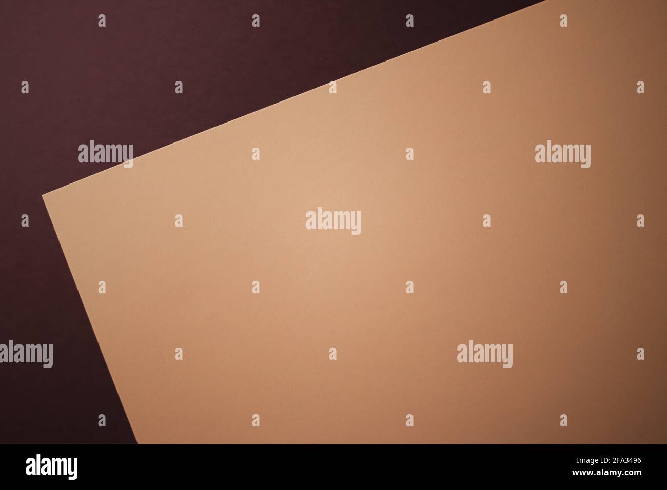 Blank A4 paper, beige on dark background as office stationery flatlay ...