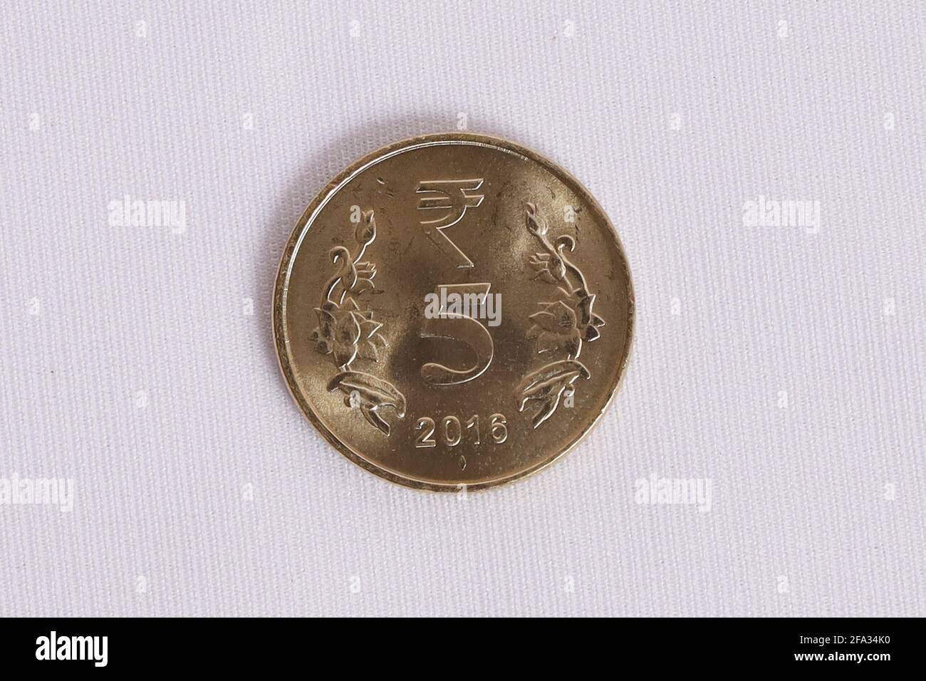 Indian five rupees coin isolated on white background Stock Photo - Alamy