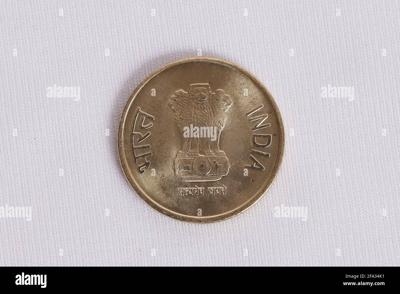 Indian rupee coin isolated on white background Stock Photo - Alamy