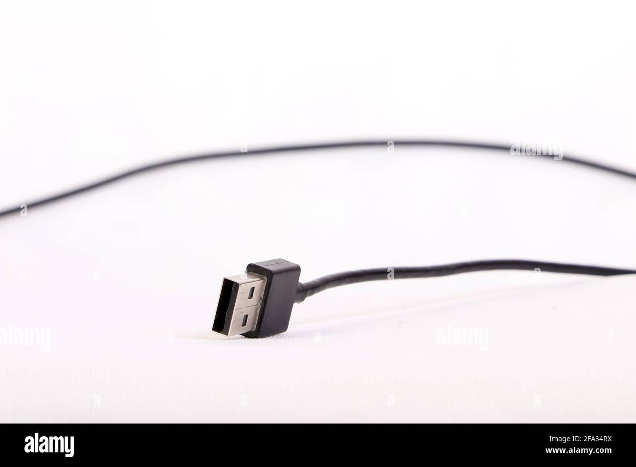 USB cable on white background Stock Photo - Alamy