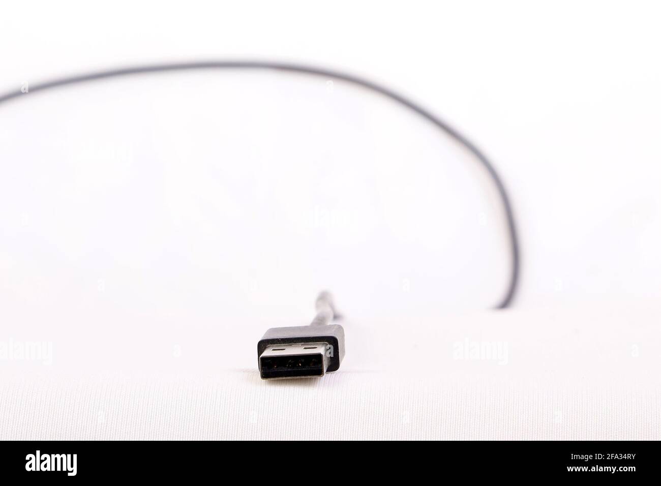 USB cable on white background Stock Photo - Alamy