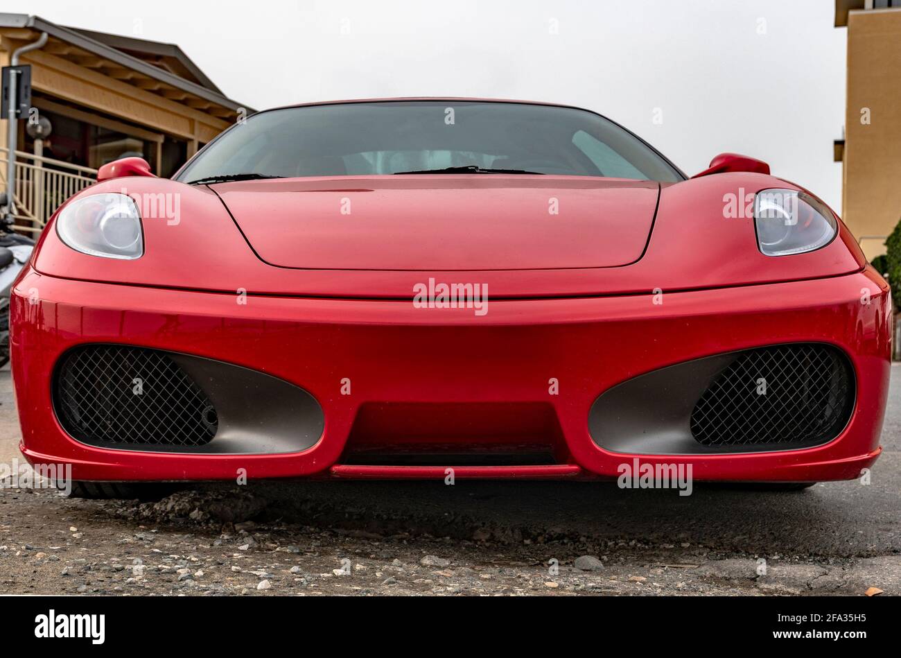 Front view of a red sports car Stock Photo - Alamy