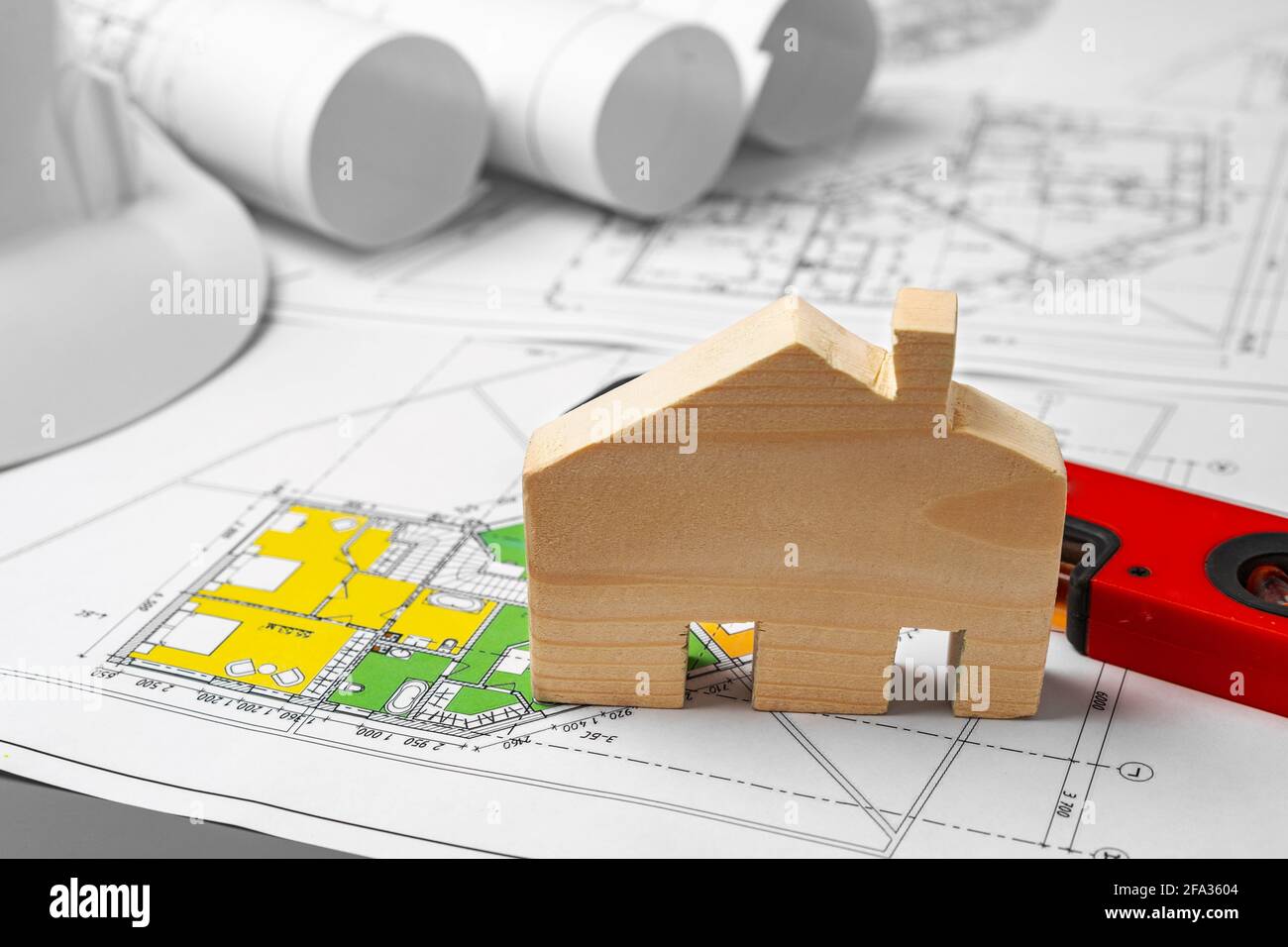 Architectural construction plans paper on table close up Stock Photo ...