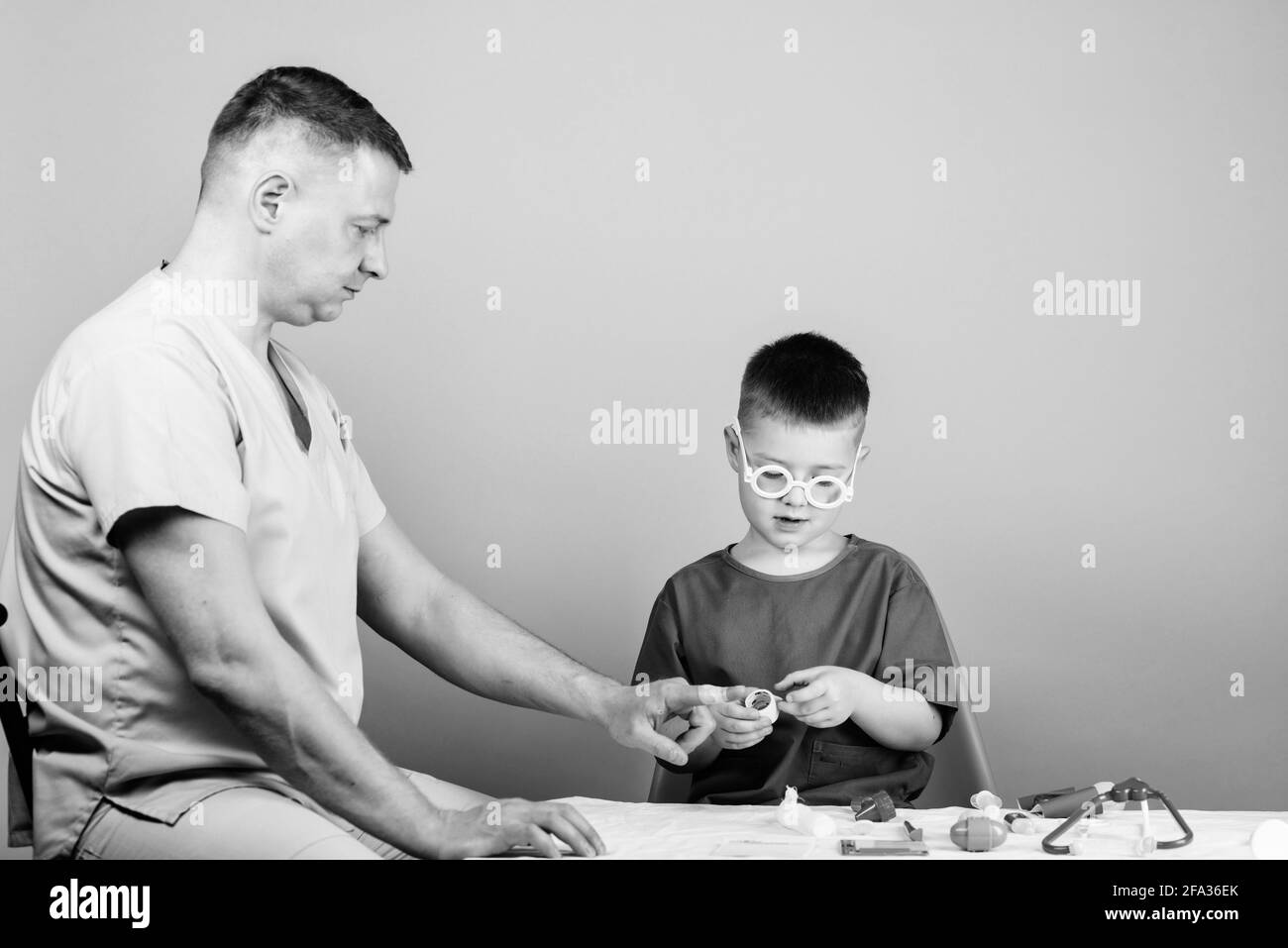 Medical examination. Boy cute child and his father doctor. Hospital ...