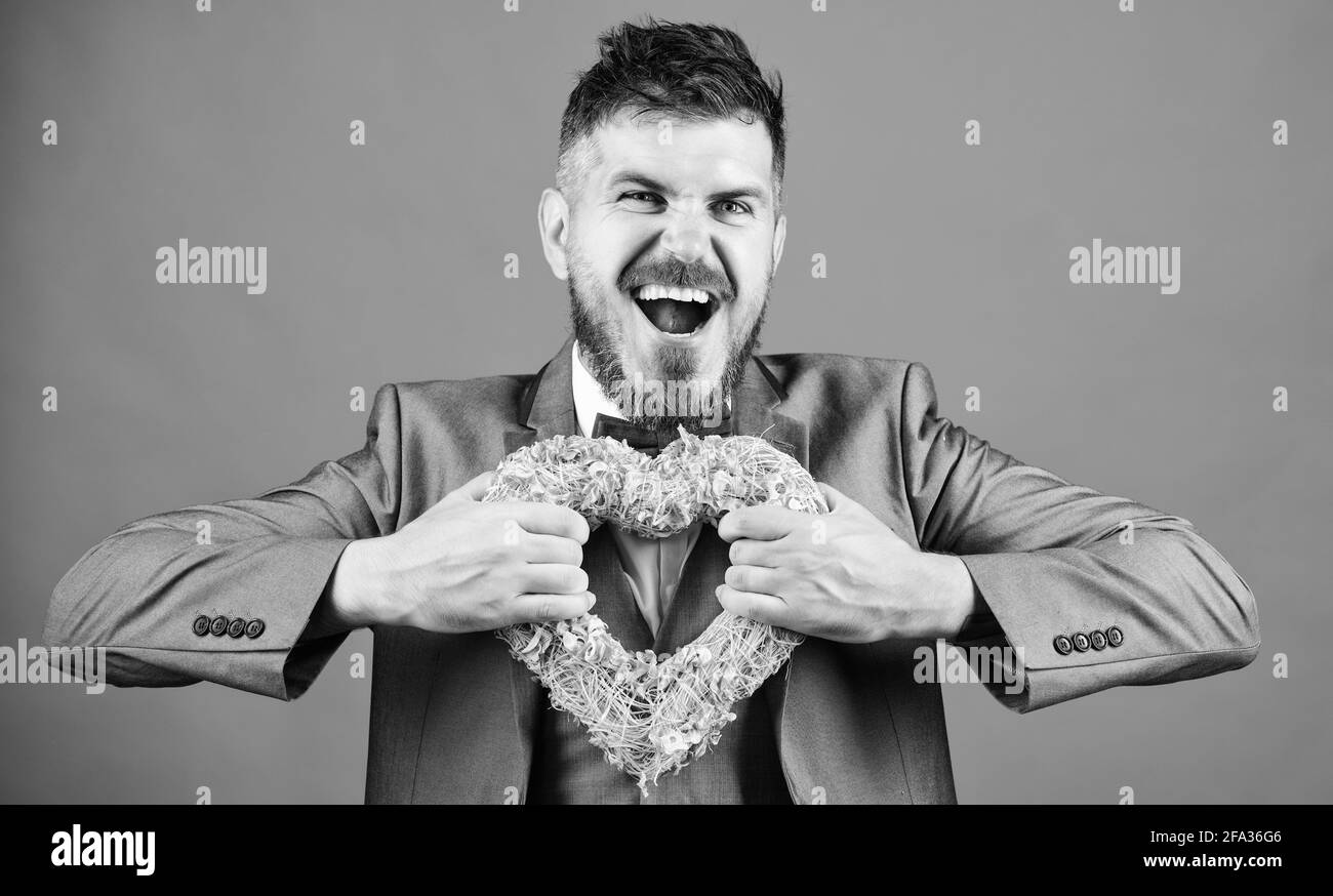 Romantic surprise. Man formal suit celebrate valentines day green ...