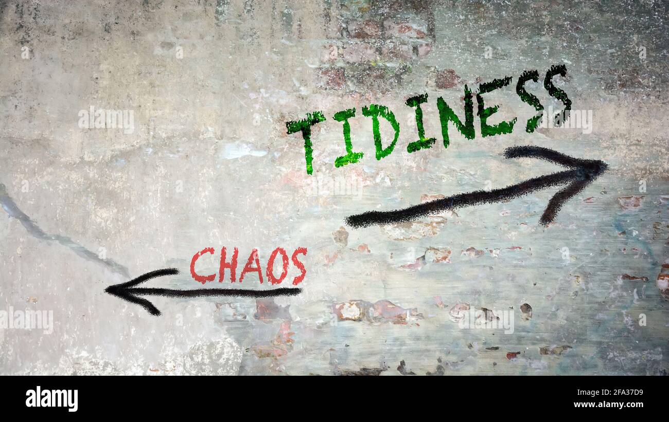 Street Sign the Direction Way to Tidiness versus Chaos Stock Photo - Alamy