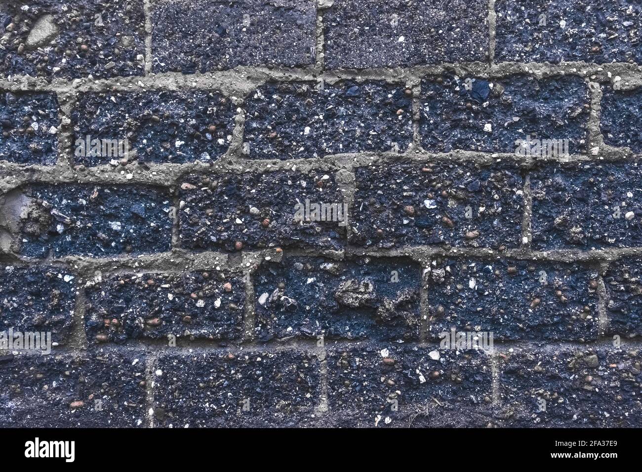 Dark blue old slag brick wall texture background Stock Photo - Alamy