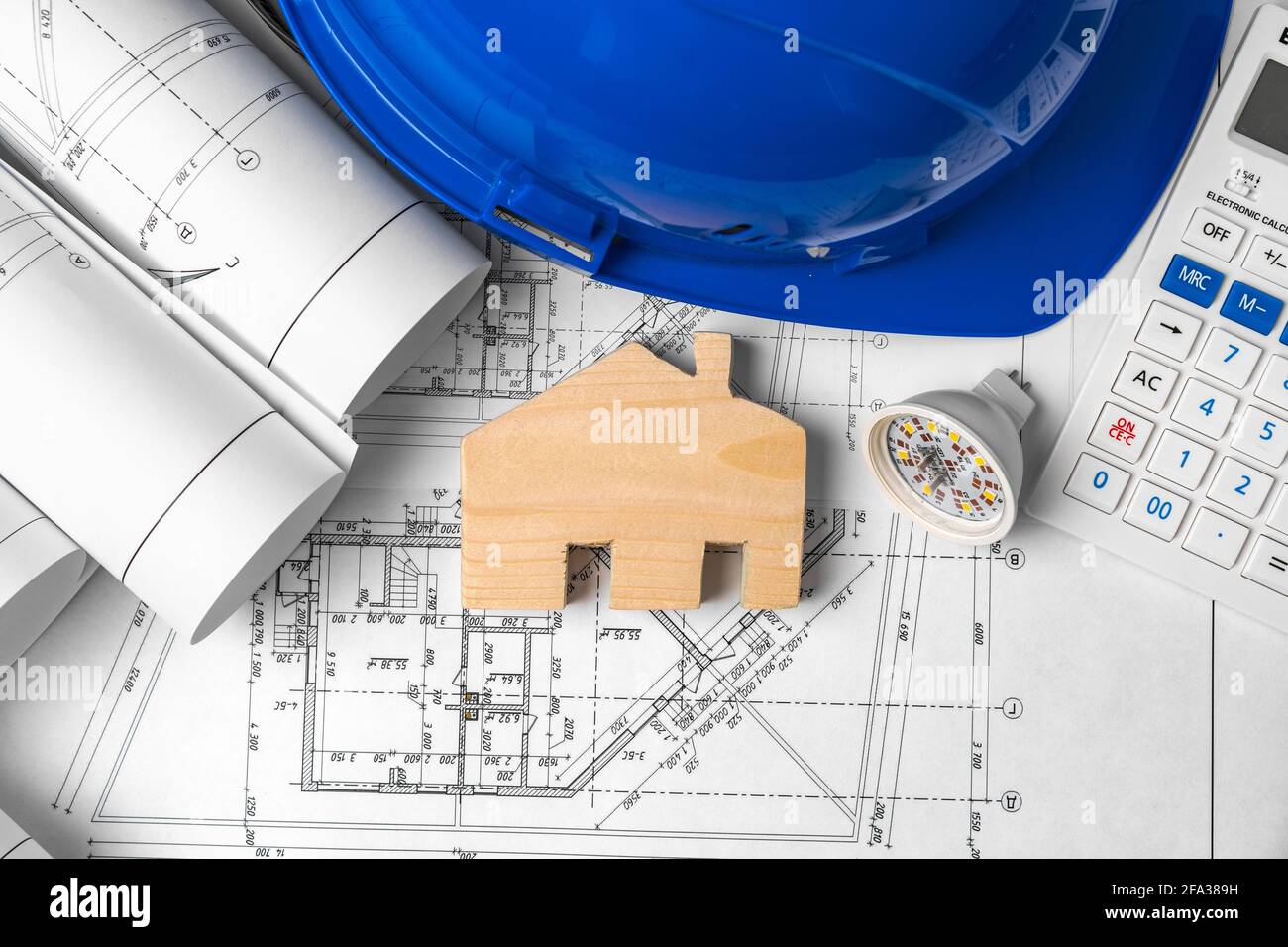 Architectural construction plans paper on table close up Stock Photo ...