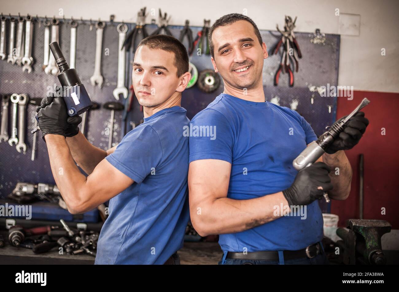 Mechanic laughing hi-res stock photography and images - Alamy