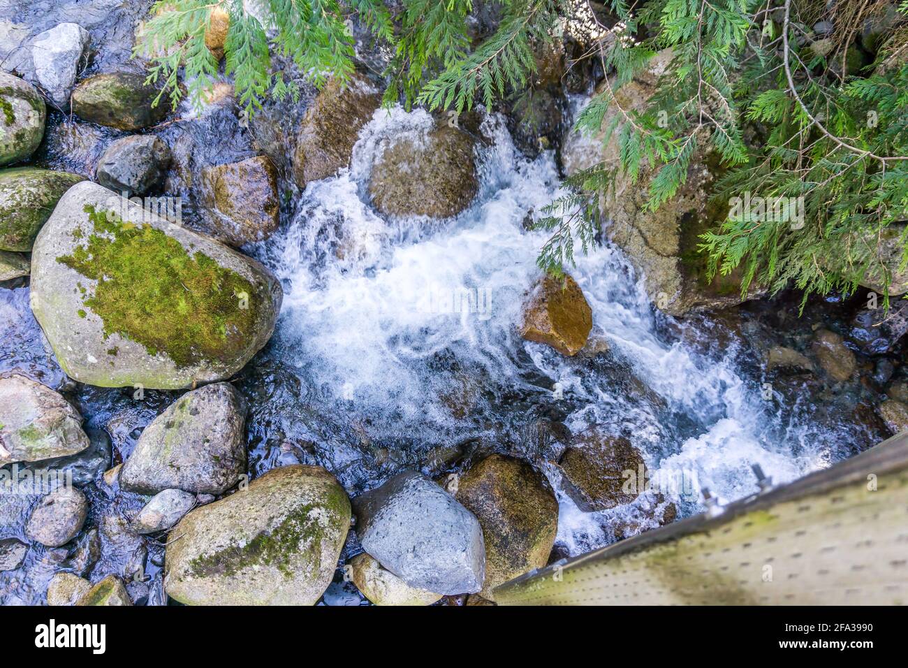 Water rushes through rock creating whitewater Stock Photo - Alamy