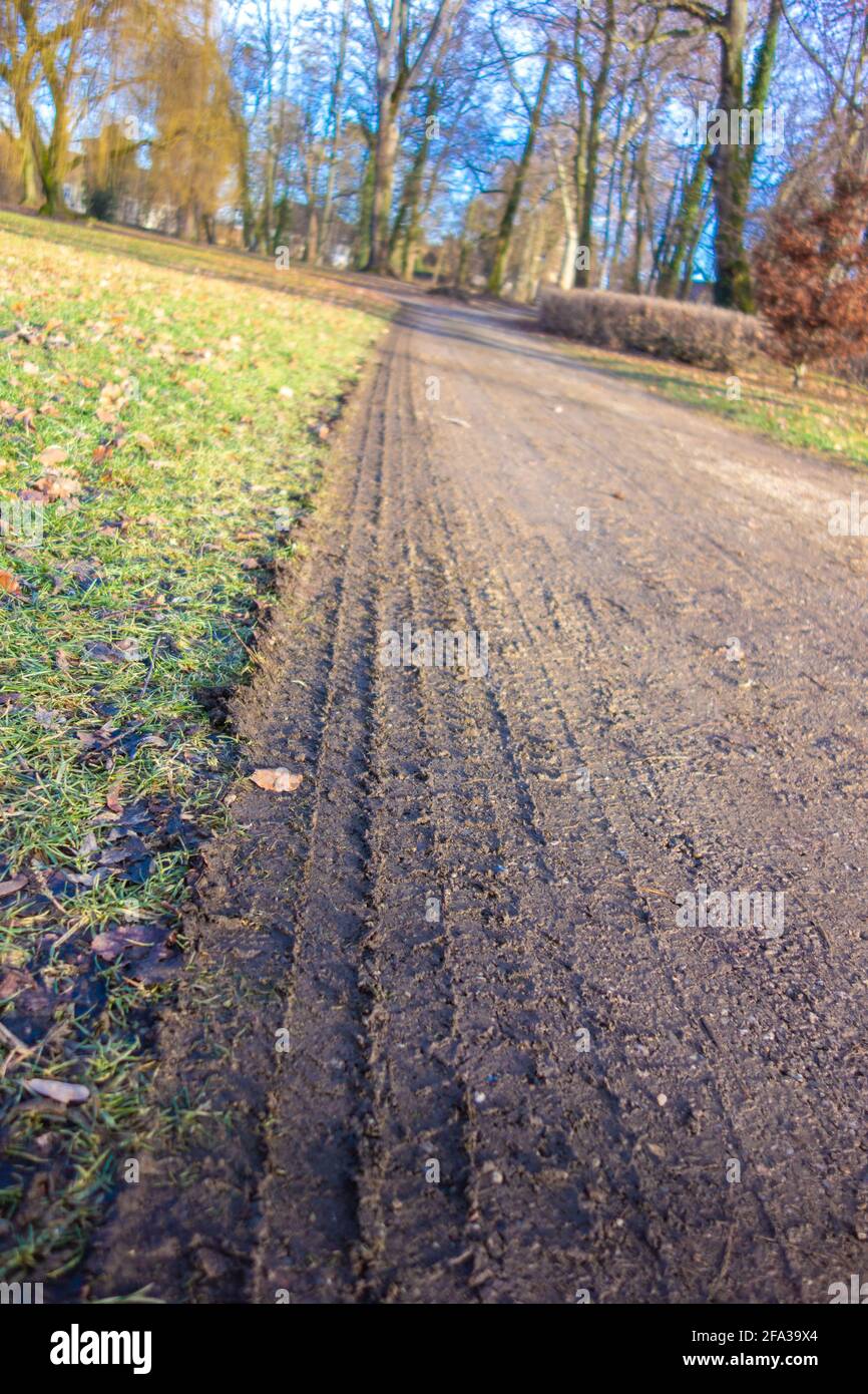 Vertical close up shot of wheel trail in the countryside Stock Photo ...