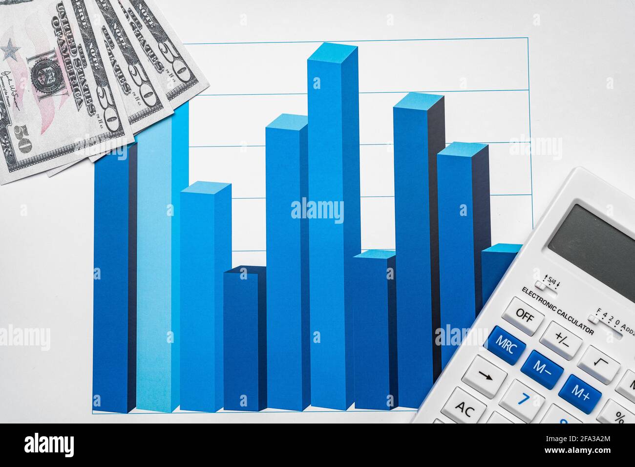 Financial paper with charts and diagrams on gray table Stock Photo - Alamy