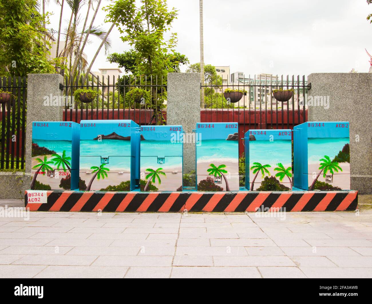 A set of electric transformer utility covers colorfully painted to look ...
