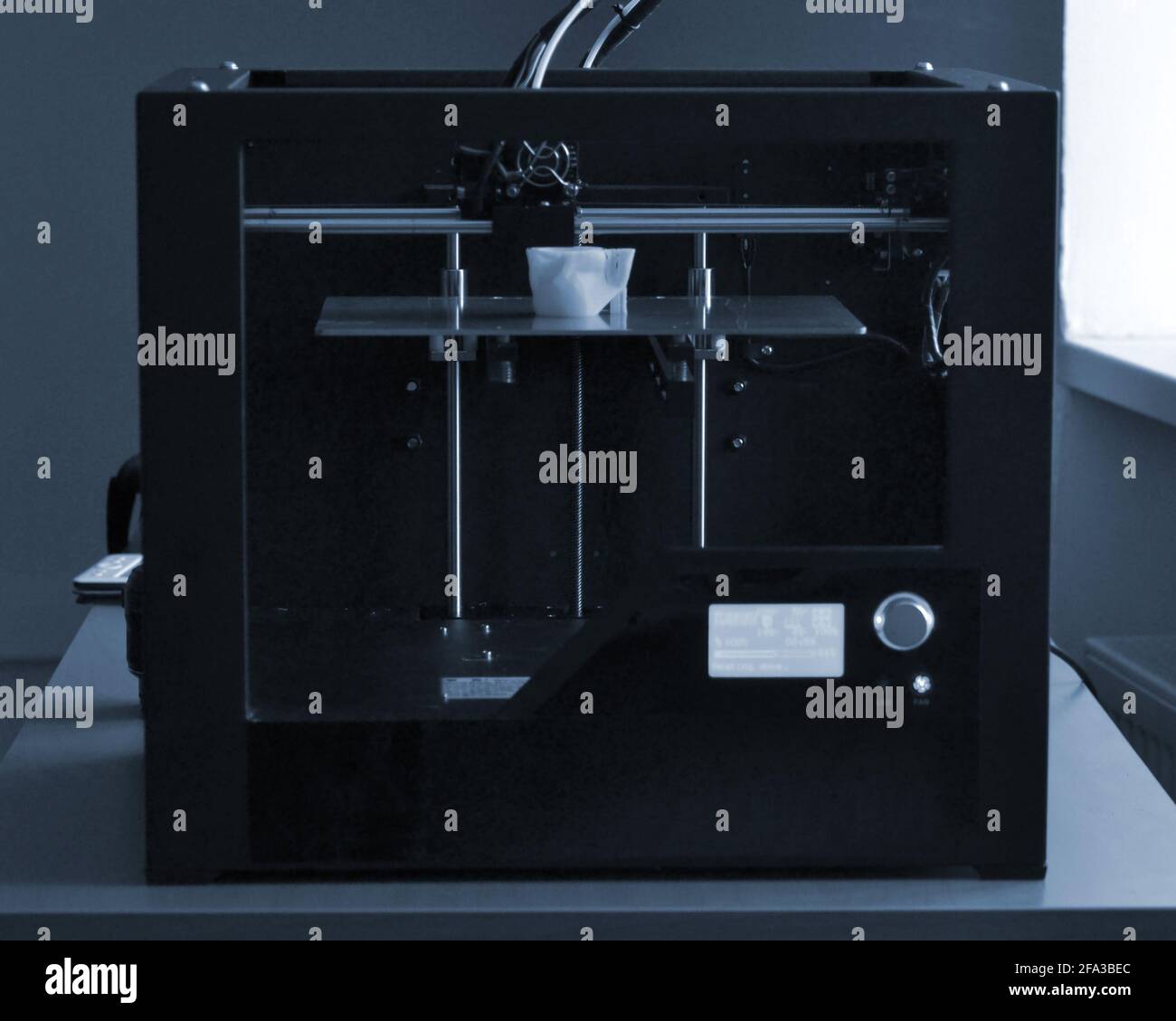 Objects printed by 3d printer. Automatic three dimensional 3d printer ...