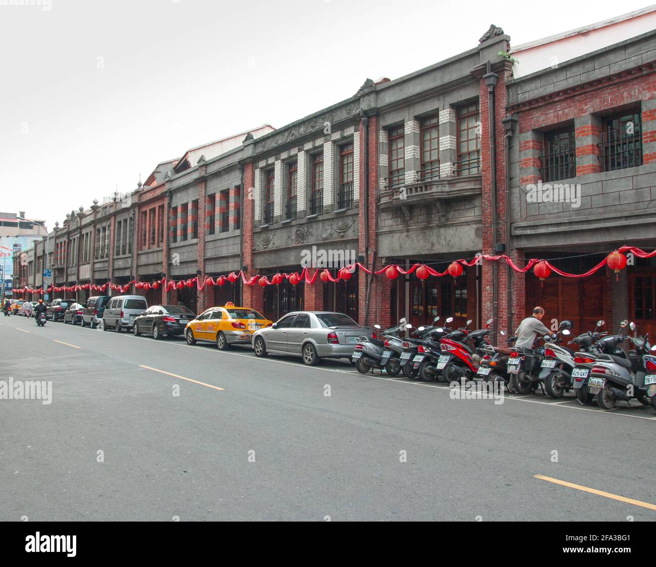 Looking down the street at the historic red brick and stone old ...