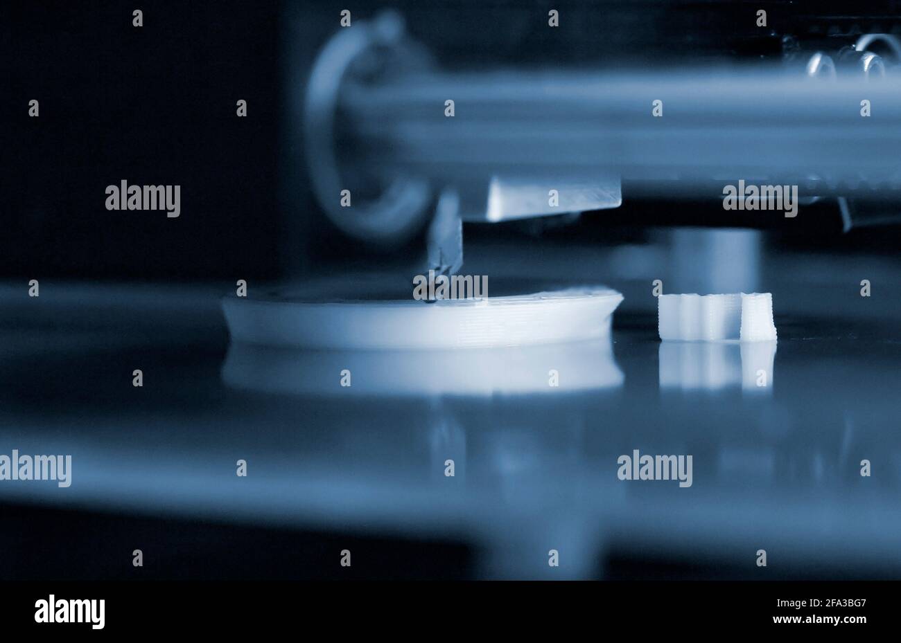 Objects printed by 3d printer. Automatic three dimensional 3d printer ...