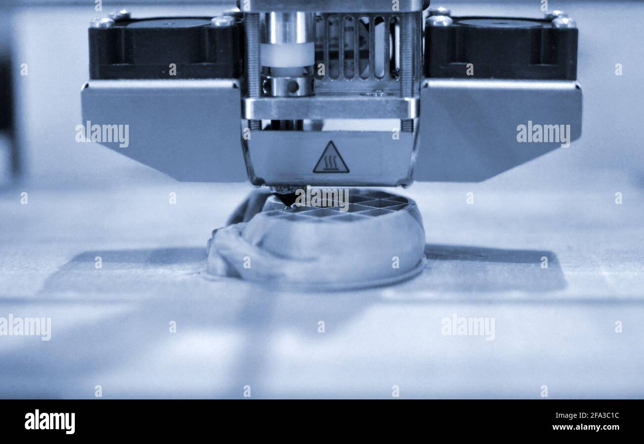 Objects printed by 3d printer. Automatic three dimensional 3d printer ...