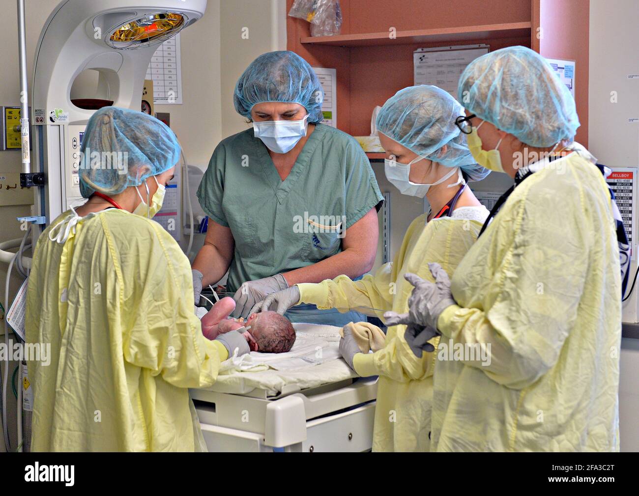 nurses with a newborn baby Stock Photo - Alamy