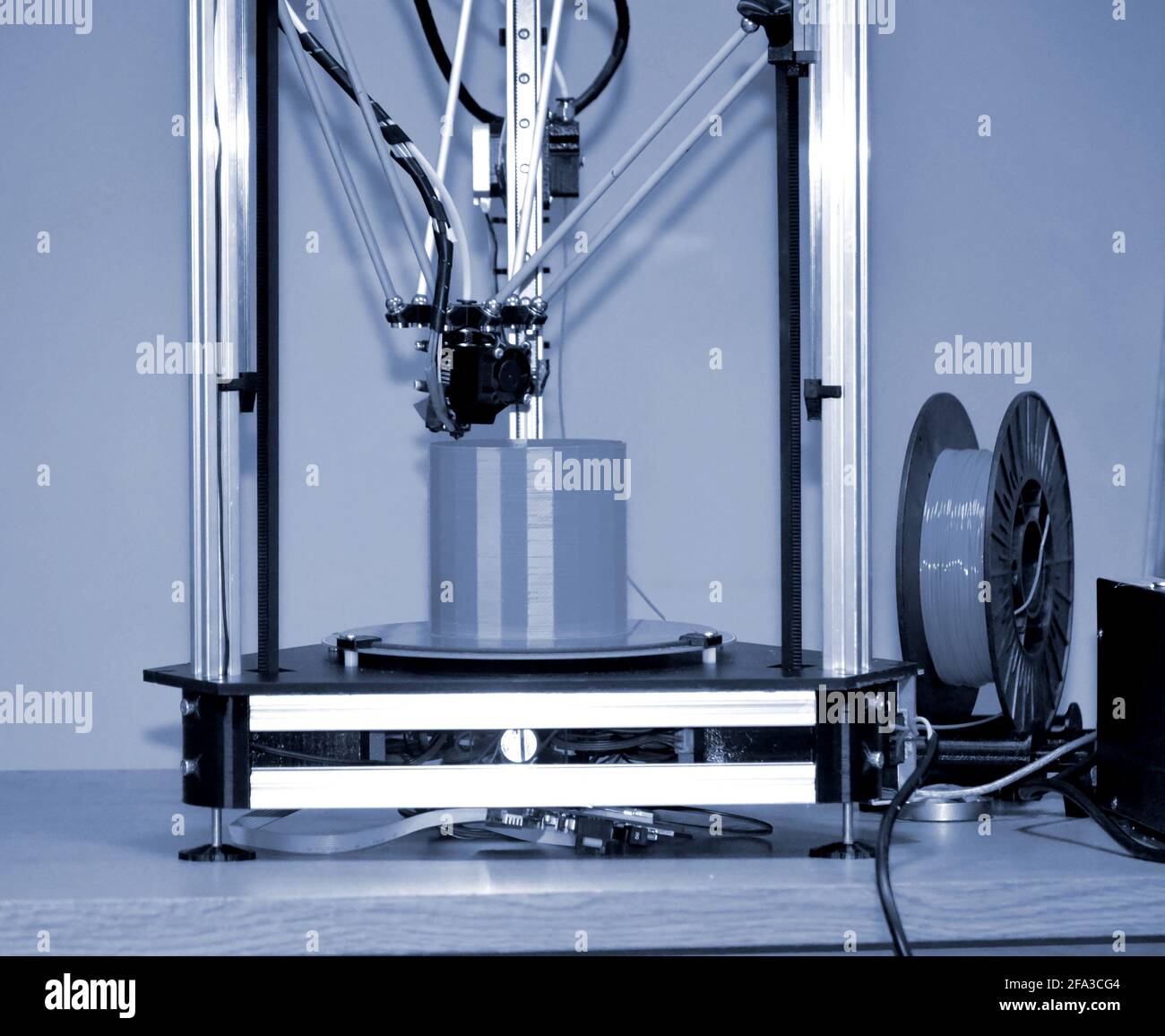Modern 3D printer printing figure close-up. Automatic three dimensional ...