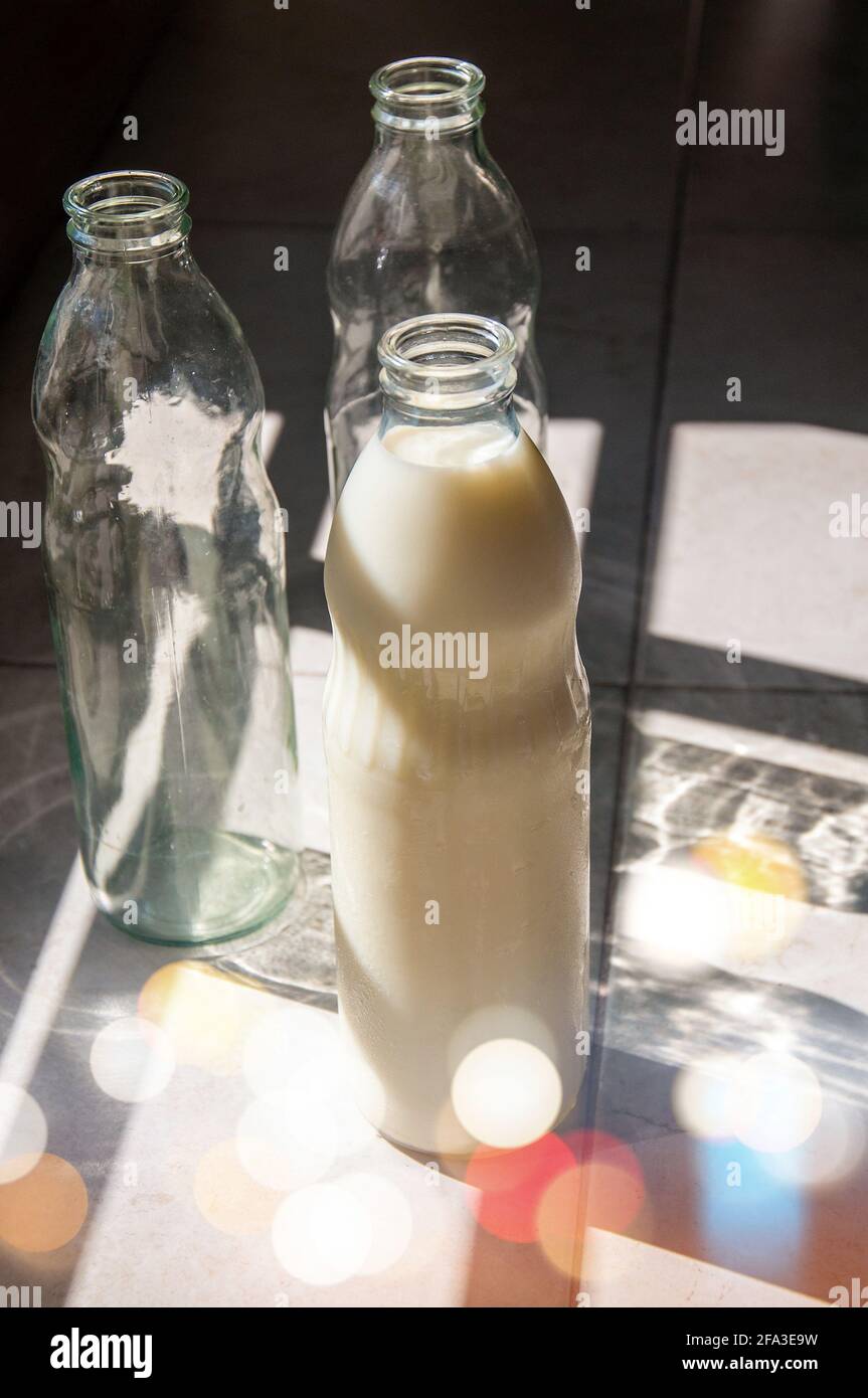 Vintage glass milk bottles hi-res stock photography and images - Alamy