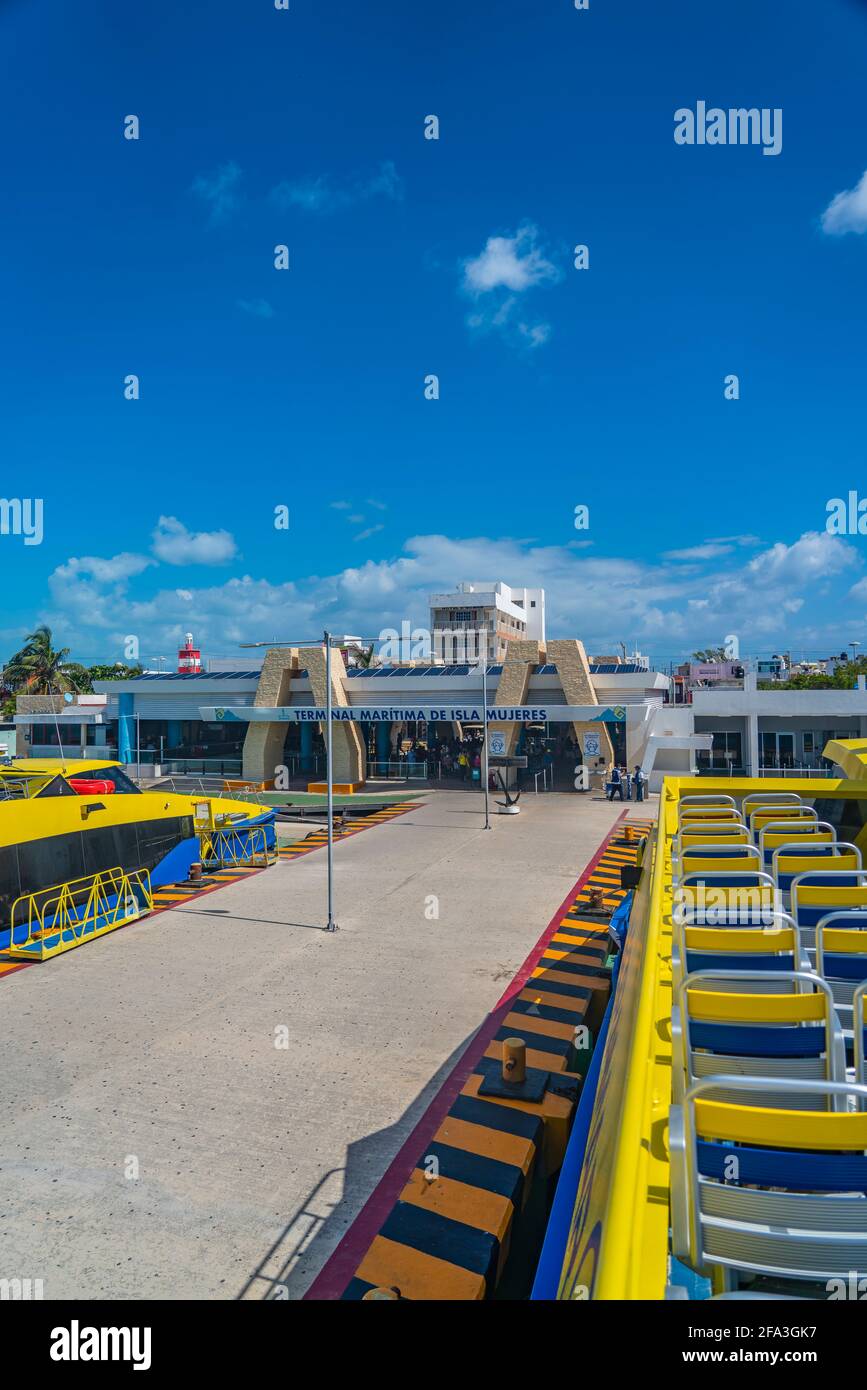 ISLA MUJERES - MARCH 13.2021: View of the ferry port with the boat ...