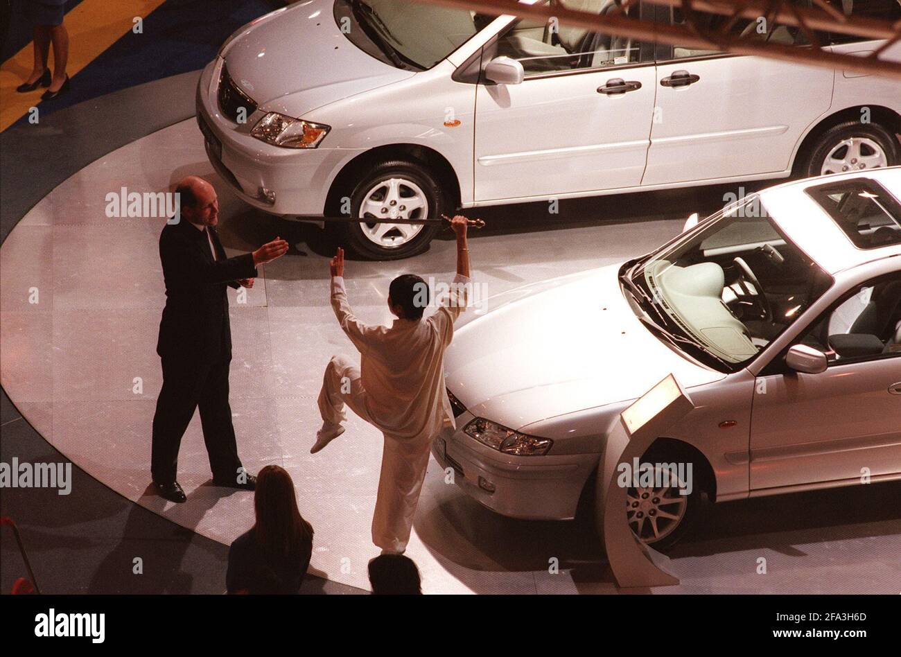 The London Motor Show 1999 At Earls Court the Mazda stand, with the M.D ...