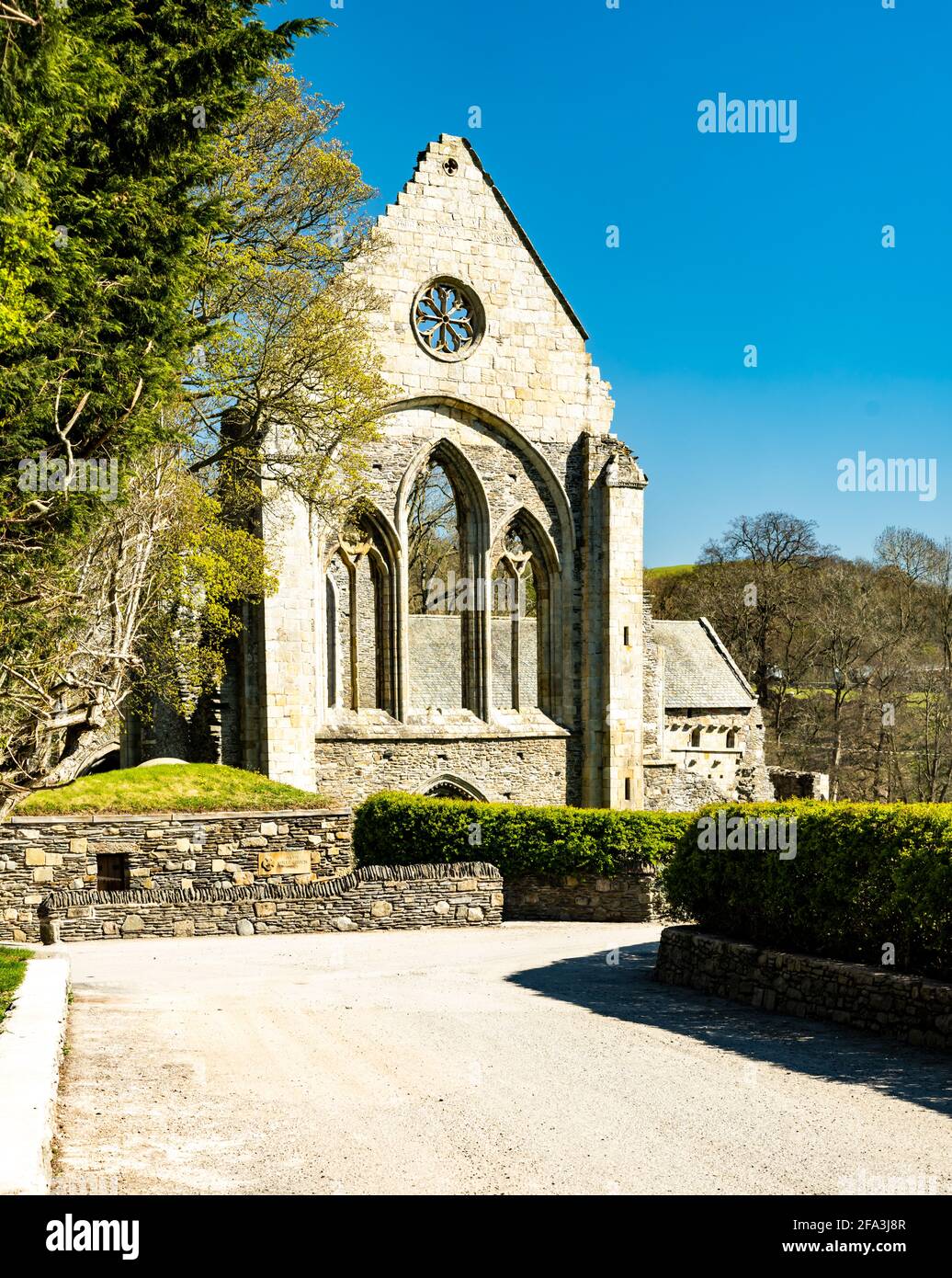 an old stone building (Valle Crucis Abbey Stock Photo - Alamy
