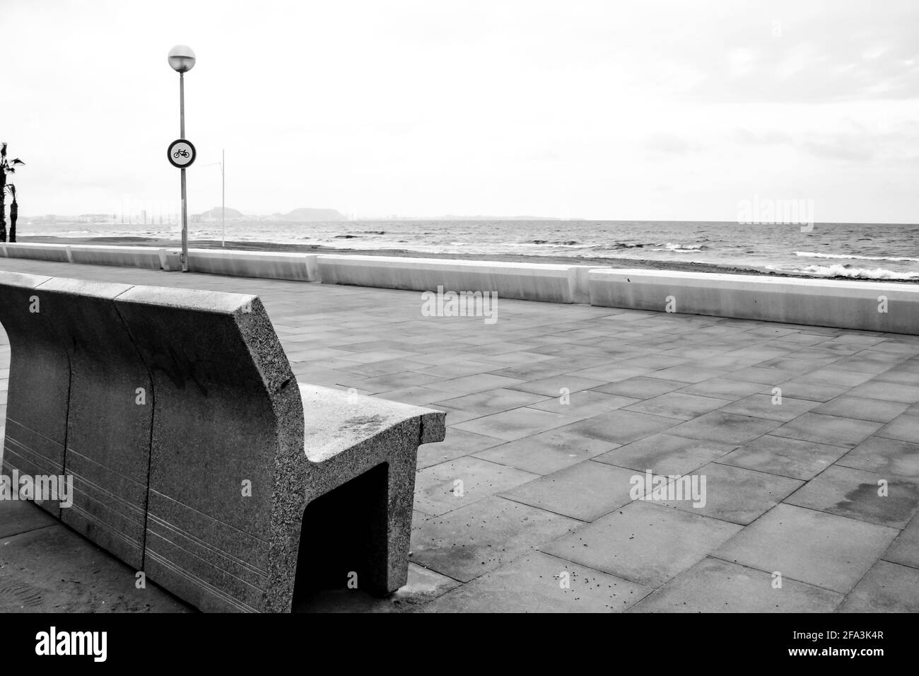 Concrete Bench with sea view on the beach in southern spain Stock Photo ...