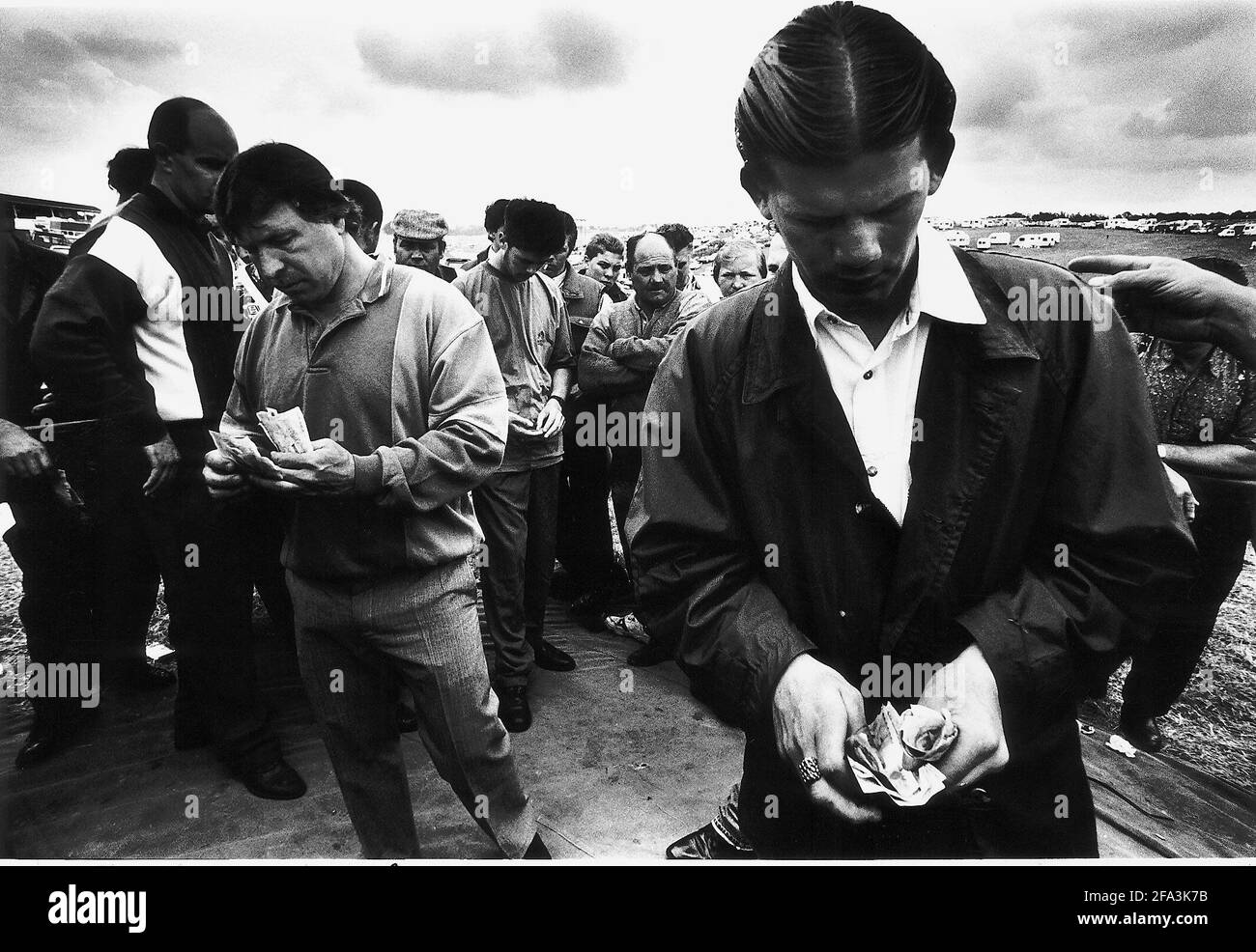 Money Changing hands after Pitch and Toss gameDBase Stock Photo - Alamy