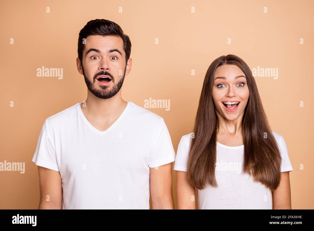 Photo of young charming couple together happy positive smile amazed ...