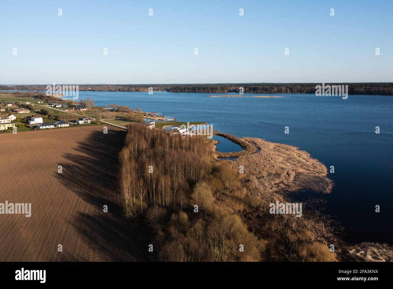 Top view of the Seim River (Ukraine), surrounded by trees and meadows ...